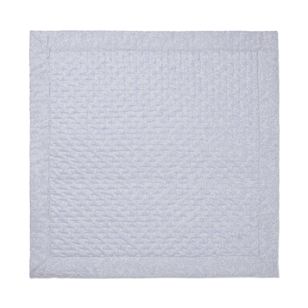 Forest quilted blanket in Clear Blue